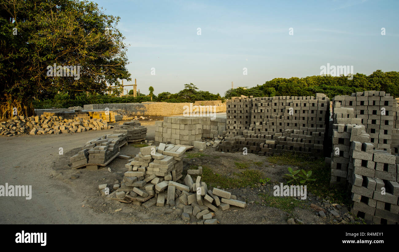 A small scale cement brick industry, nature background Stock Photo - Alamy
