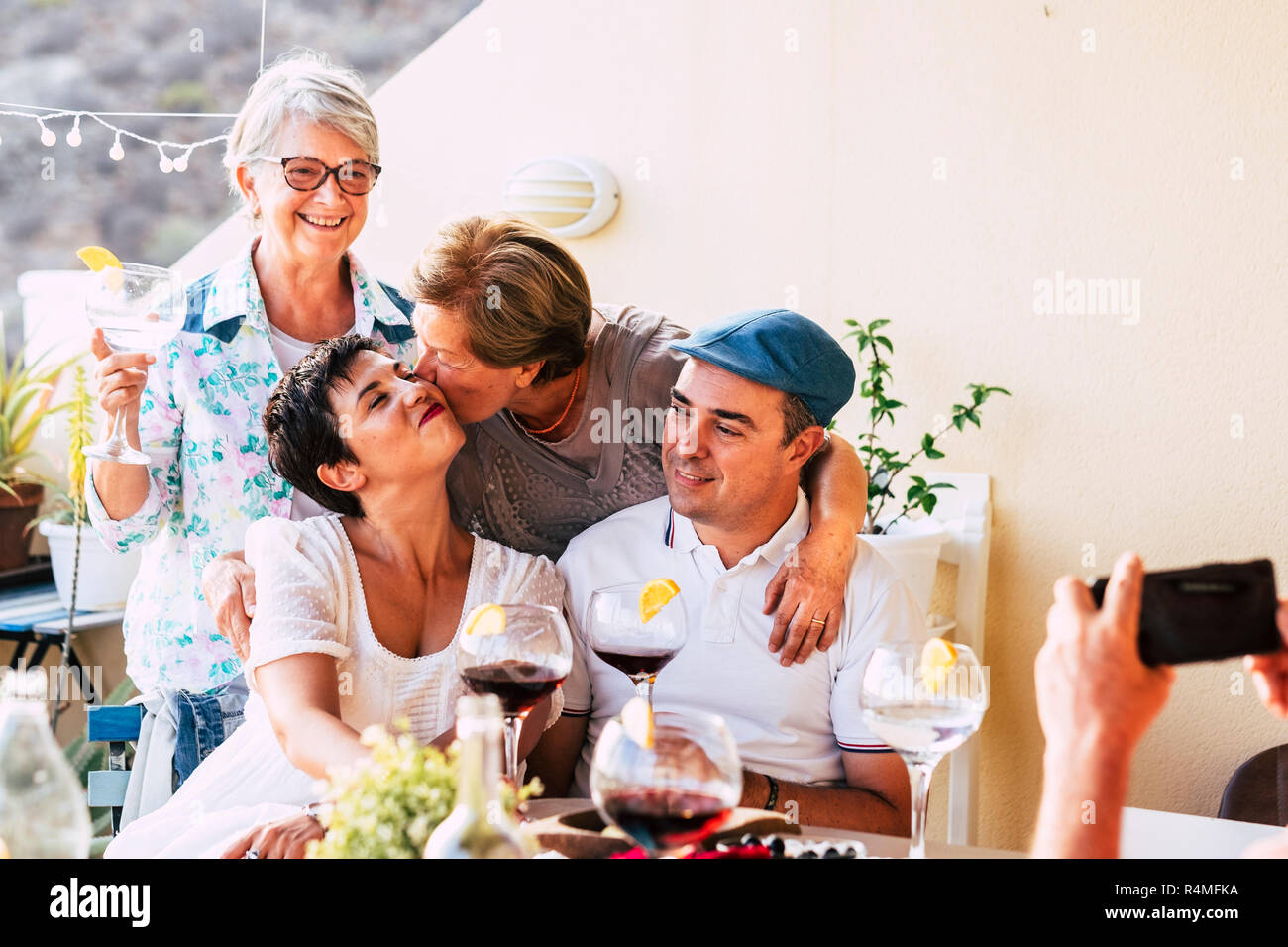 Group of mixed ages generations friends family have fun together with ...