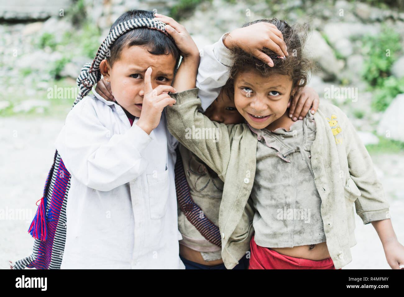TATOPANI, NEPAL - MAY 2015: portrait of three Nepali children hugging ...