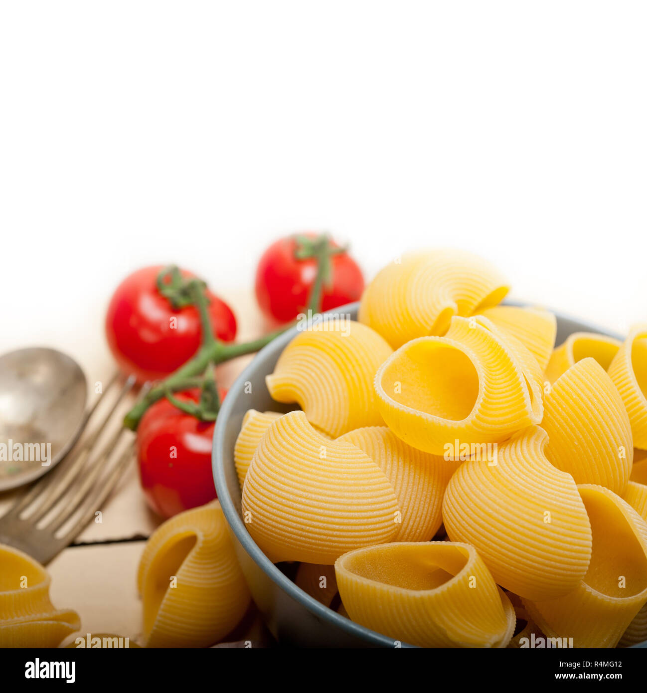 Italian snail lumaconi pasta with tomatoes Stock Photo - Alamy
