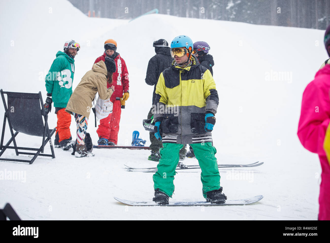 BUKOVEL,UKRAINE-20 MARCH,2018: Snowboard contest in winter park.Young ...