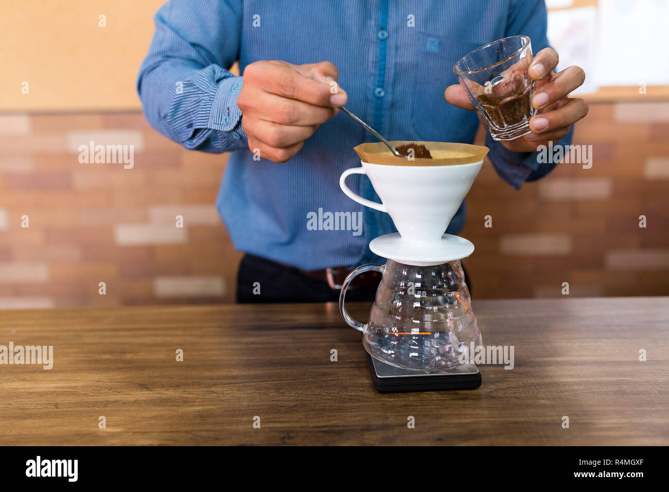 Barista making of hand drip coffee in cafe Stock Photo - Alamy