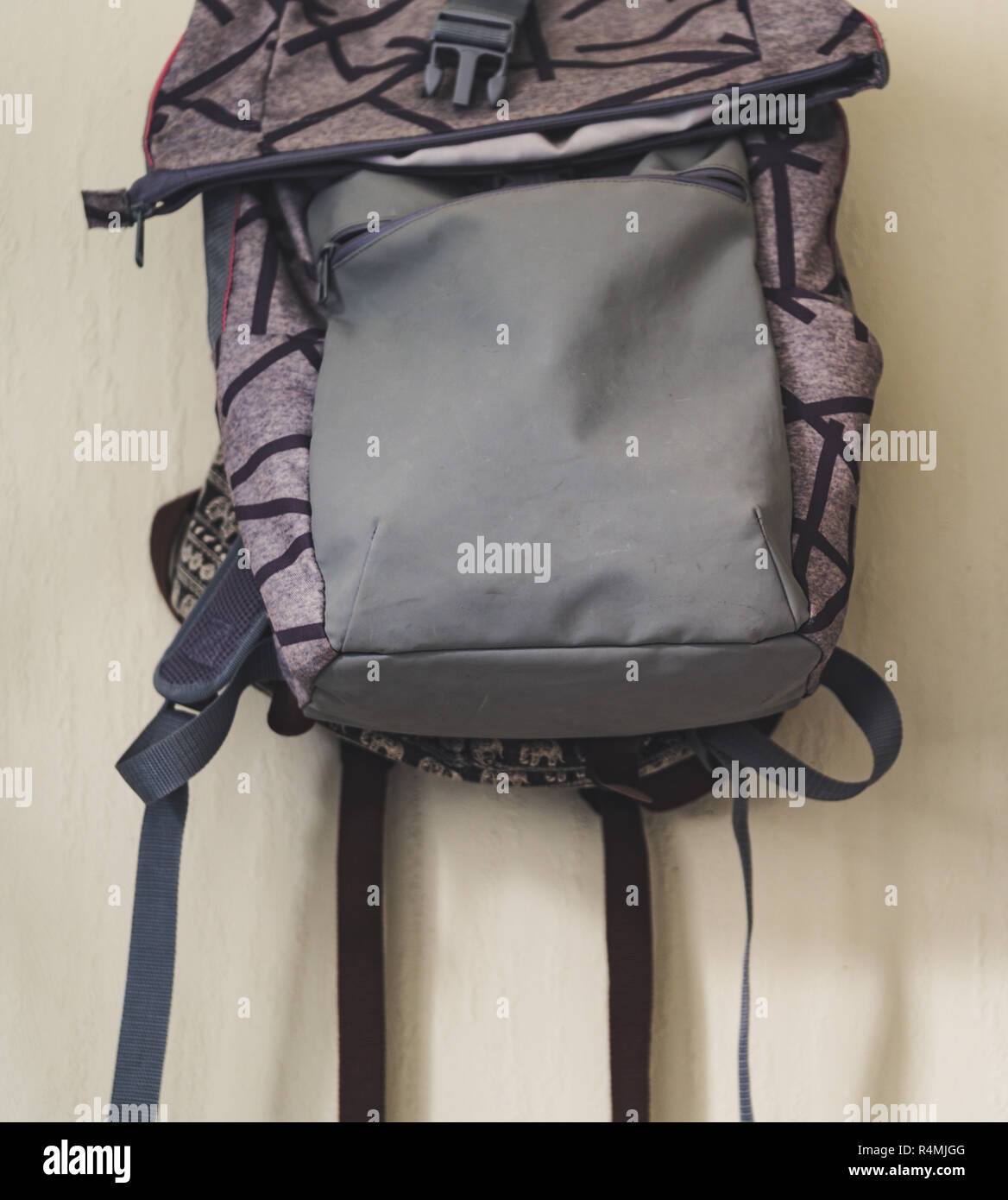 Purple School Backpack Hanging on the Wall - Isolated Object with White ...