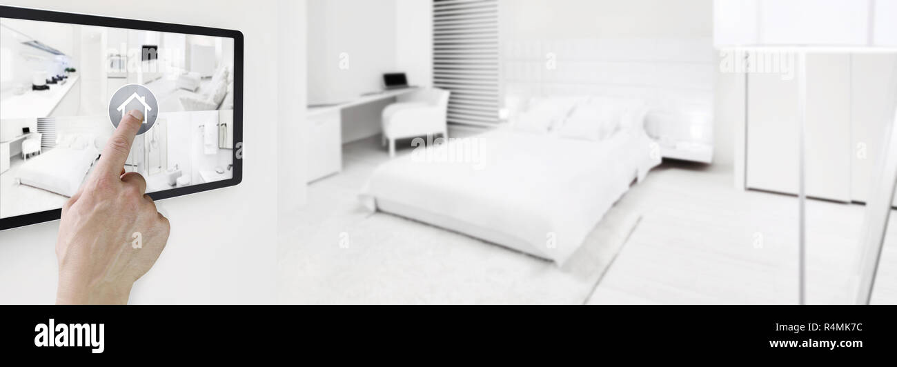 smart home automation hand touch digital tablet screen with symbols on ...