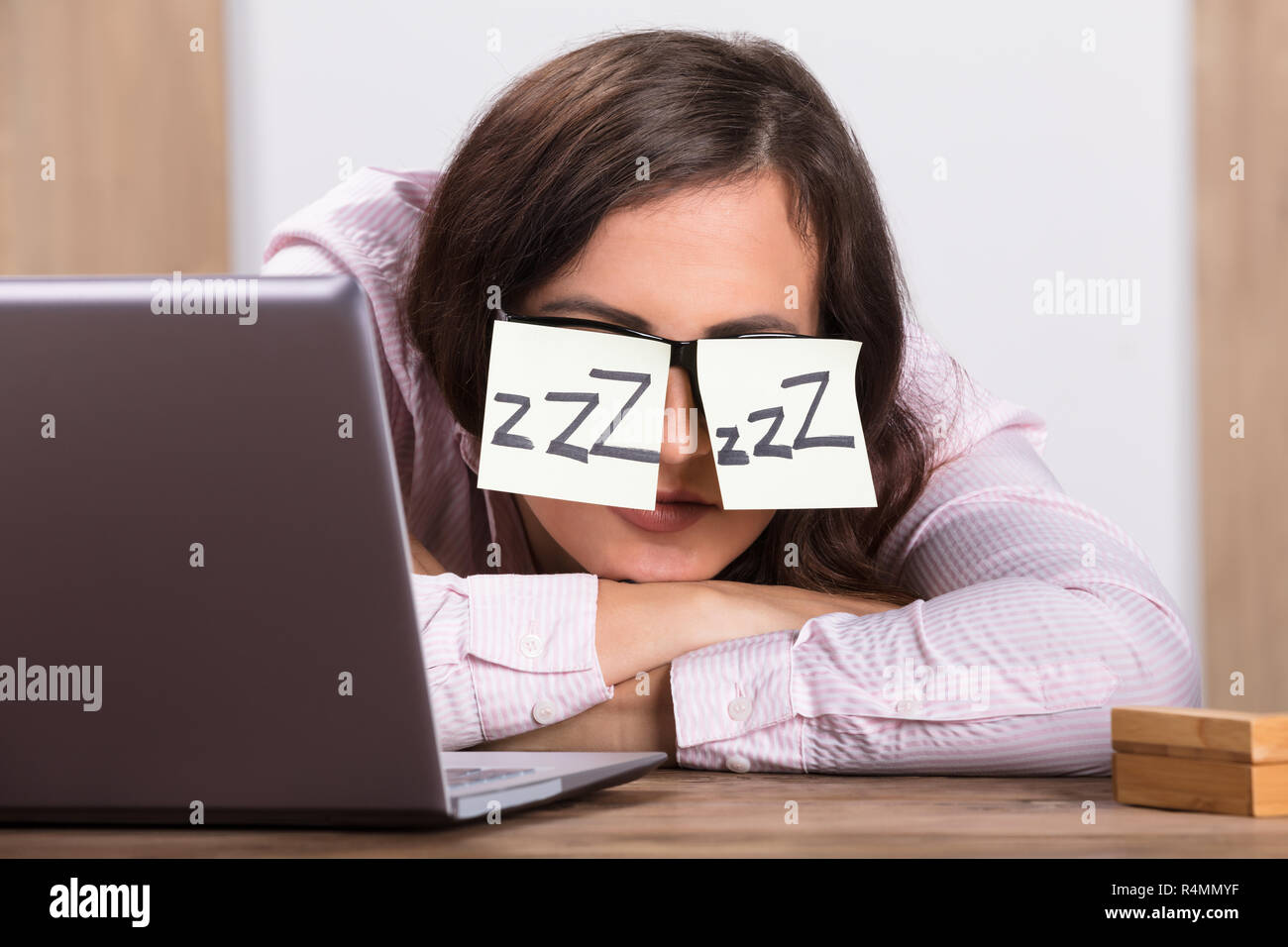 Sleeping Businesswoman Covering His Eyes With The Sticky Notes Stock ...
