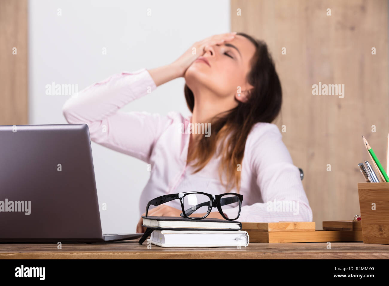 Exhausted female employee sit hi-res stock photography and images - Alamy