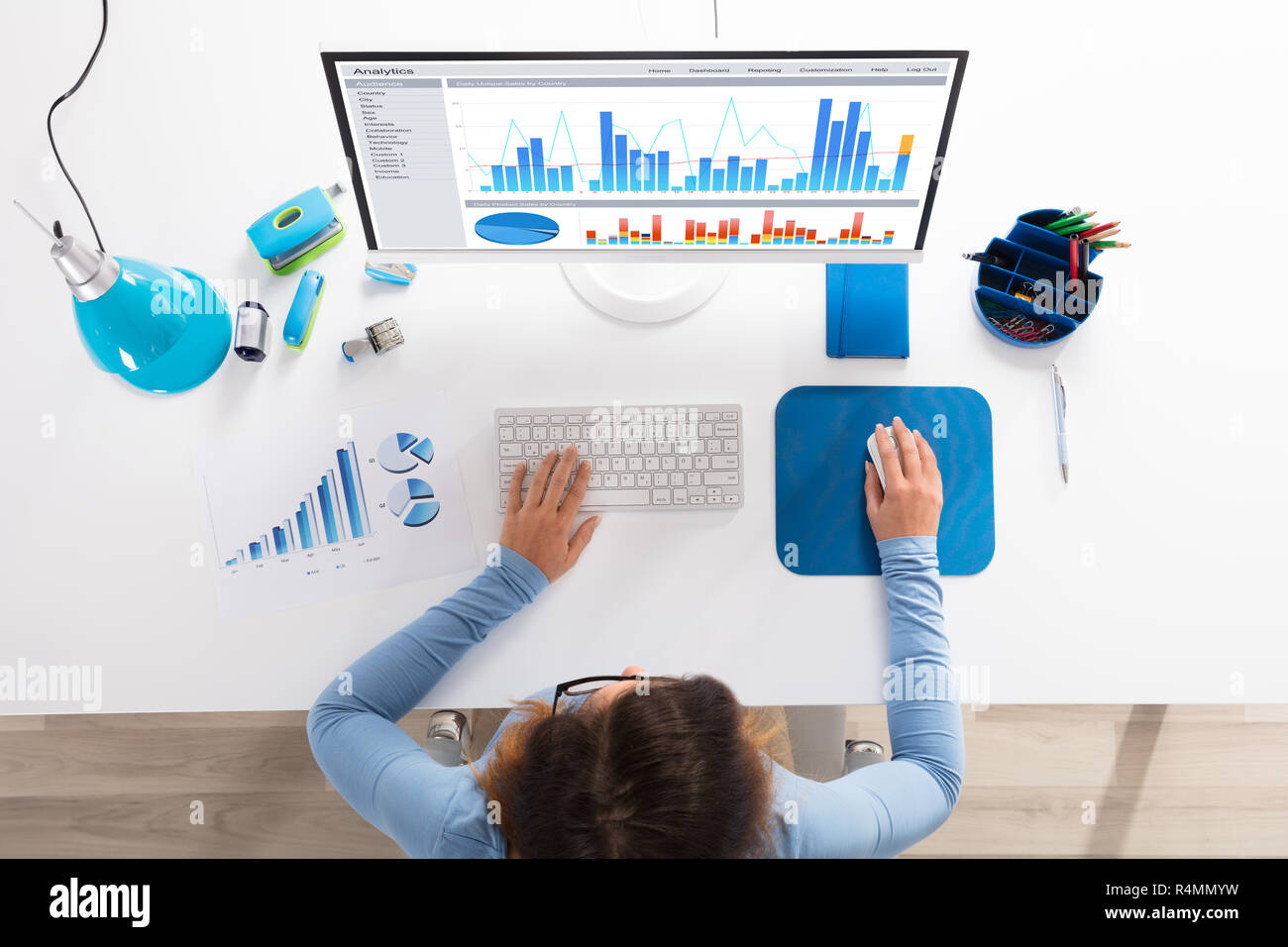 Businesswoman Analyzing Graph Stock Photo - Alamy Businesswoman Analyzing Graph Stock Photo - Alamy