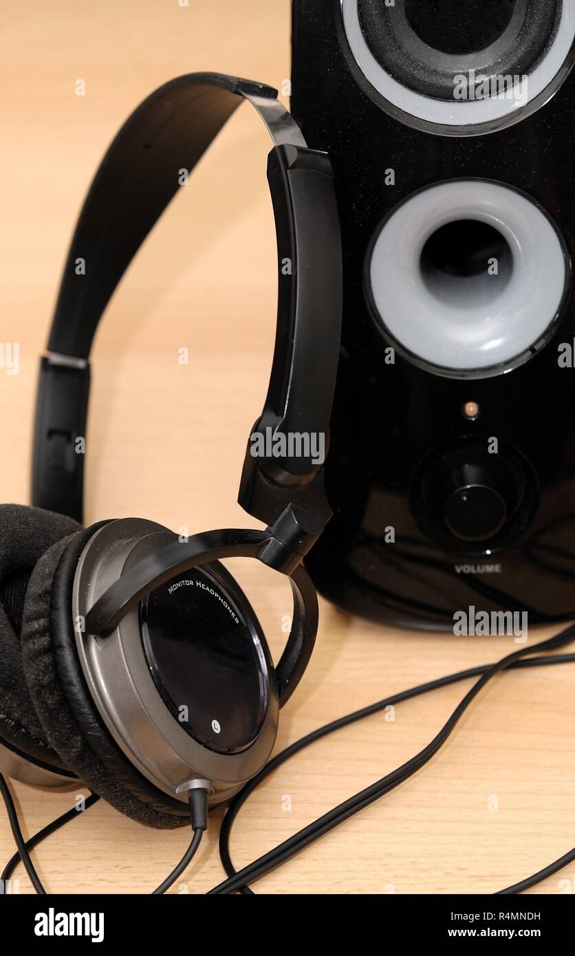 Headphones and loudspeaker Stock Photo - Alamy