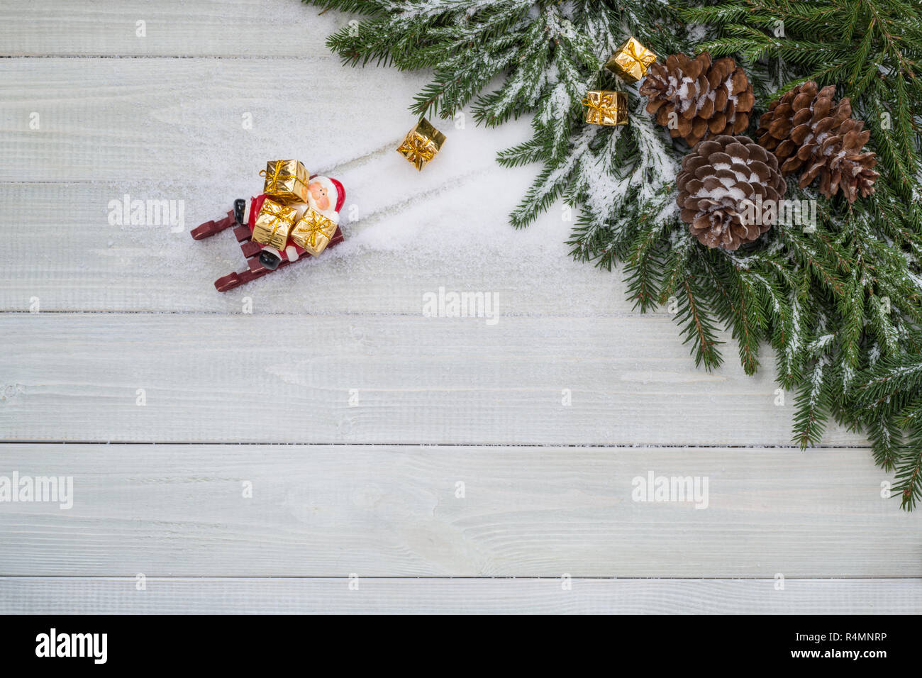 Santa Claus sledge accident in snow with lost gifts around Stock Photo ...