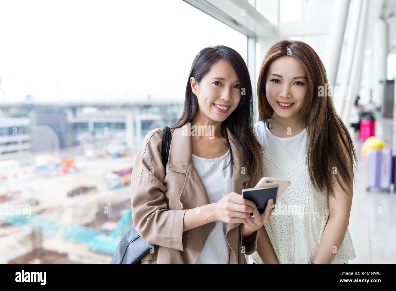 Two women go for a trip together Stock Photo - Alamy