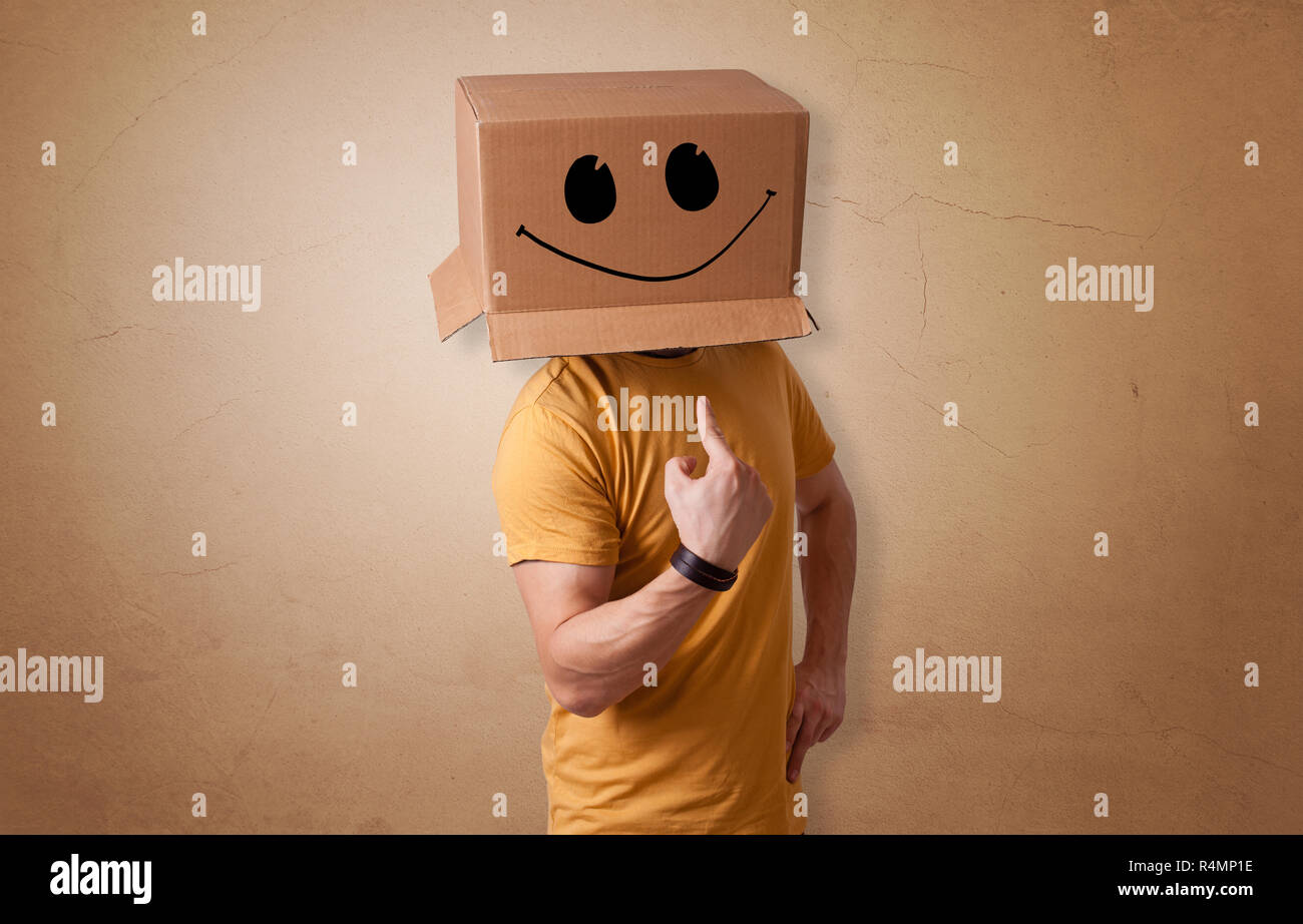 Man with cardboard box head Stock Photo - Alamy