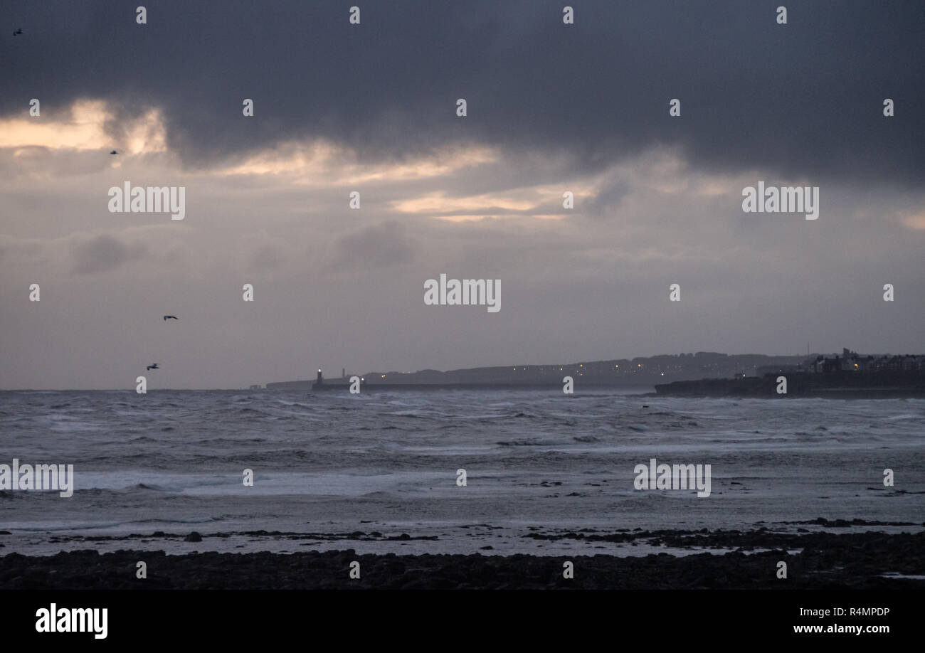 Early on a stormy November morning at St. Mary's Island, Whitley Bay ...