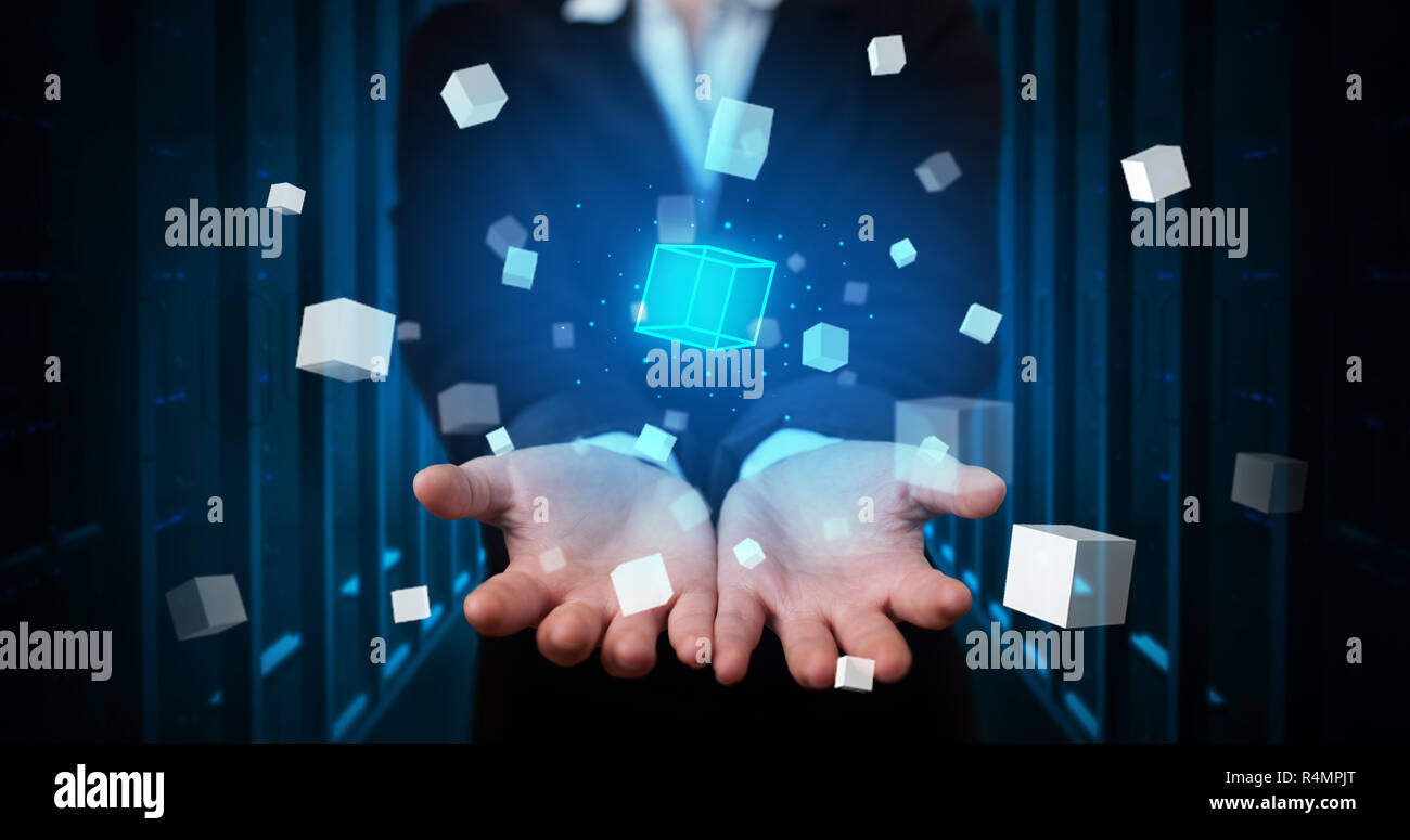 Person holding hologram projection displaying white cubes in server ...