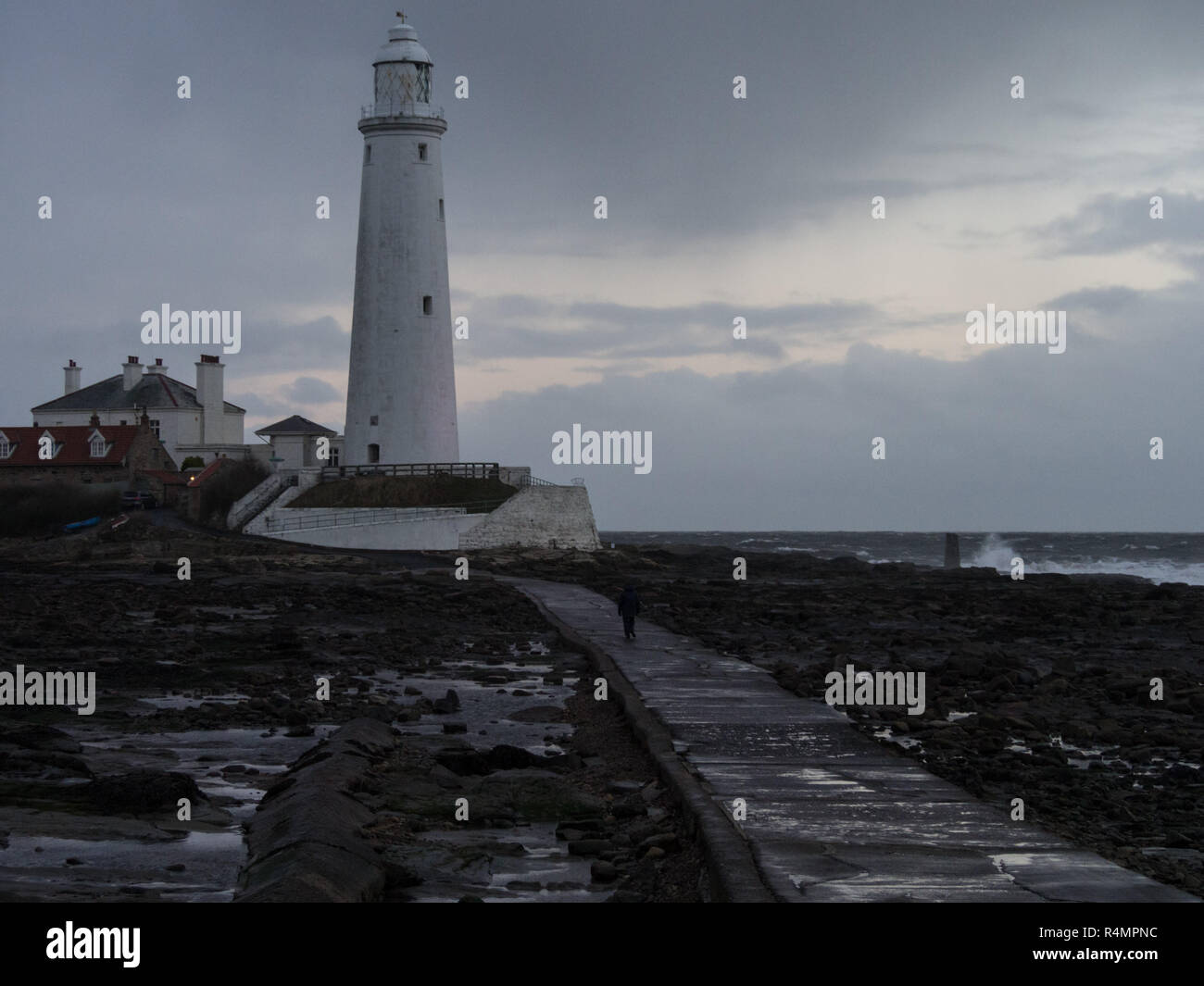 Early on a stormy November morning at St. Mary's Island, Whitley Bay ...