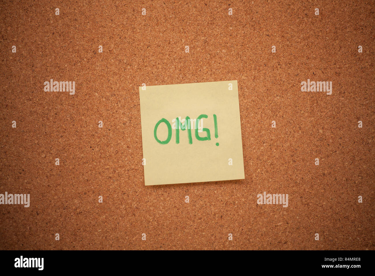 OMG note on cork board Stock Photo - Alamy