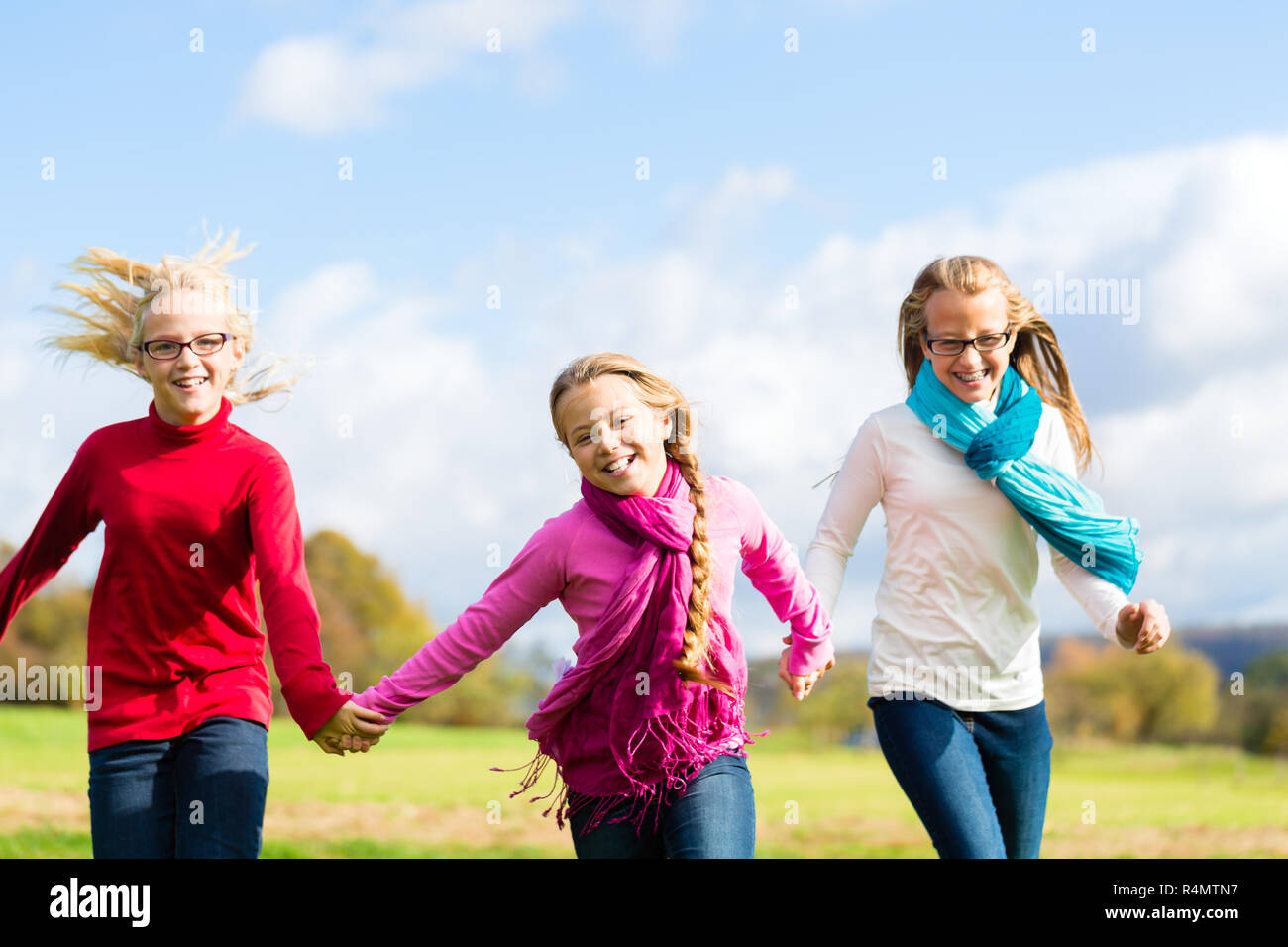 Girl runs through park hi-res stock photography and images - Alamy