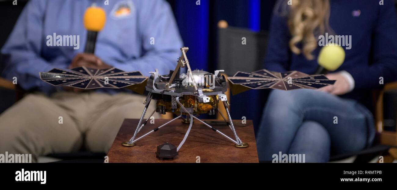 A model of the Mars InSight lander is on display during a social media ...