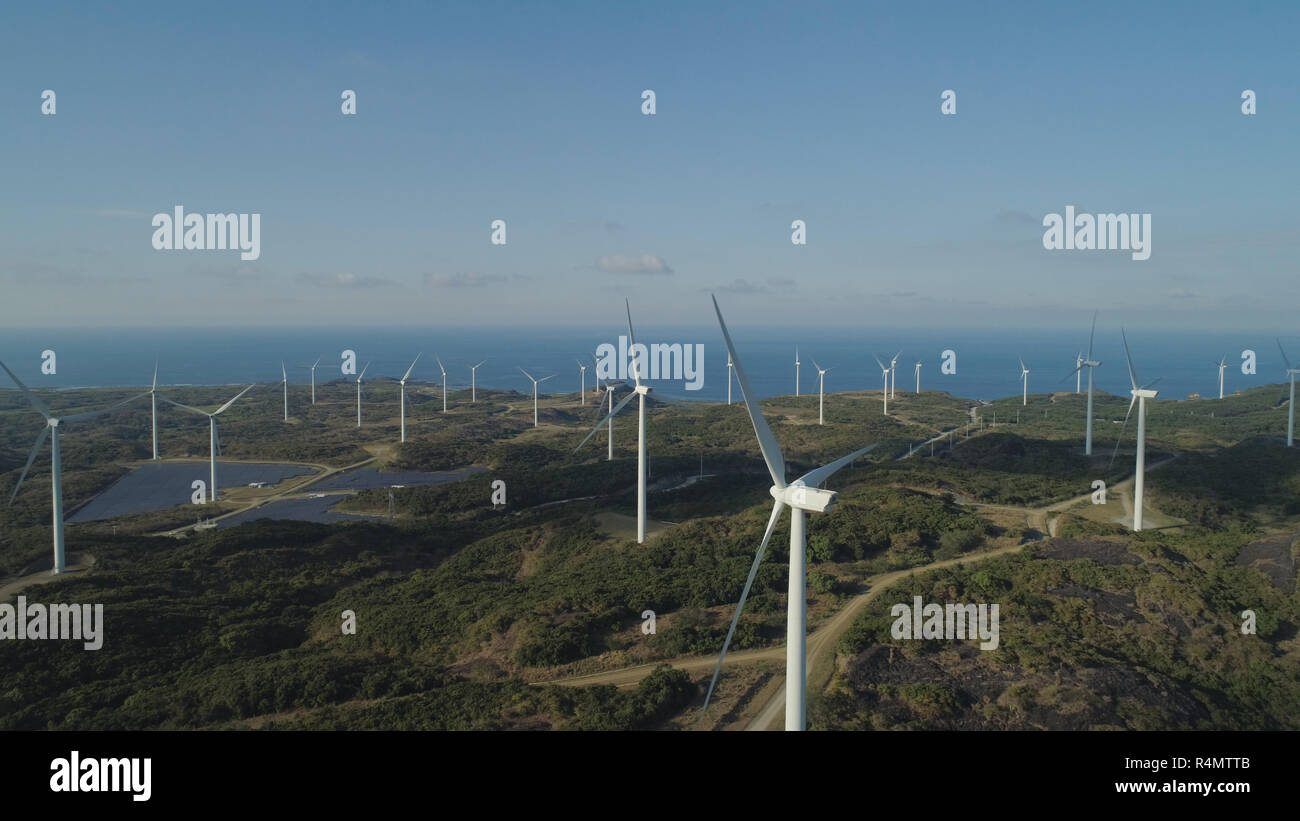 Aerial view of Windmills for electric power production on the seashore ...