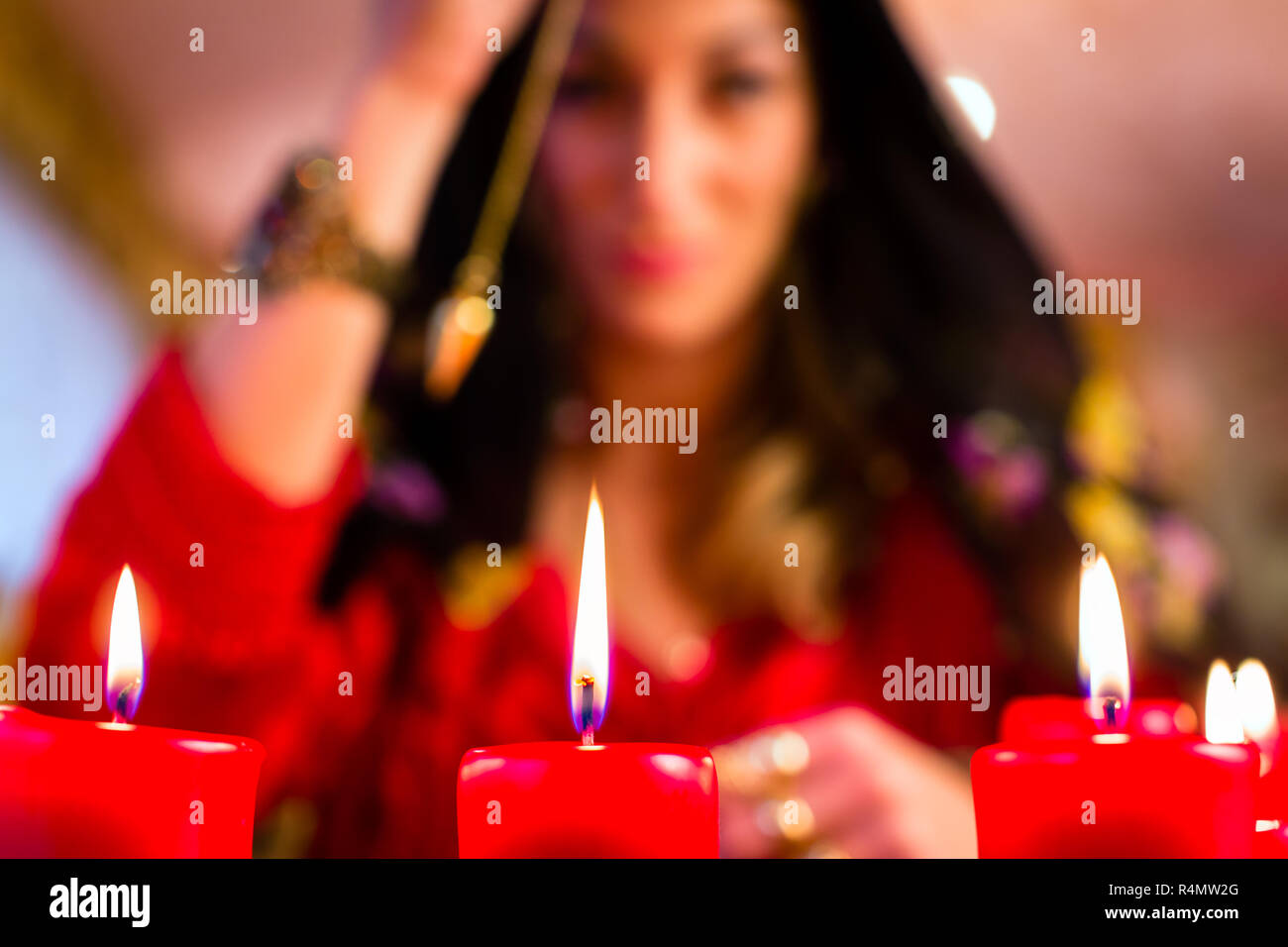 Woman pendulum dowsing hi-res stock photography and images - Alamy