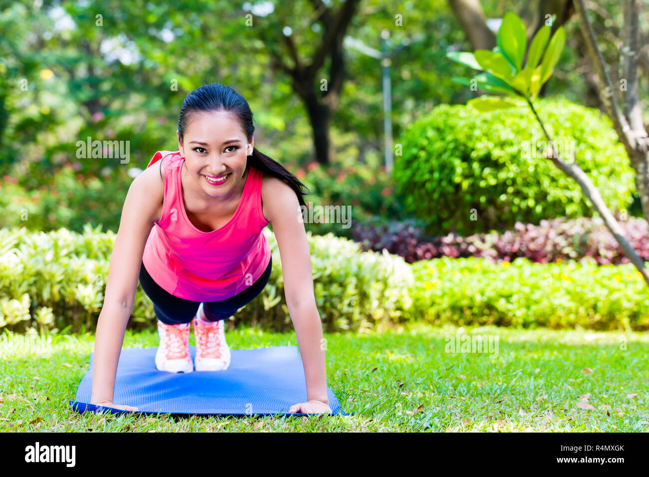 Athlete doing pushups in park hi-res stock photography and images - Alamy