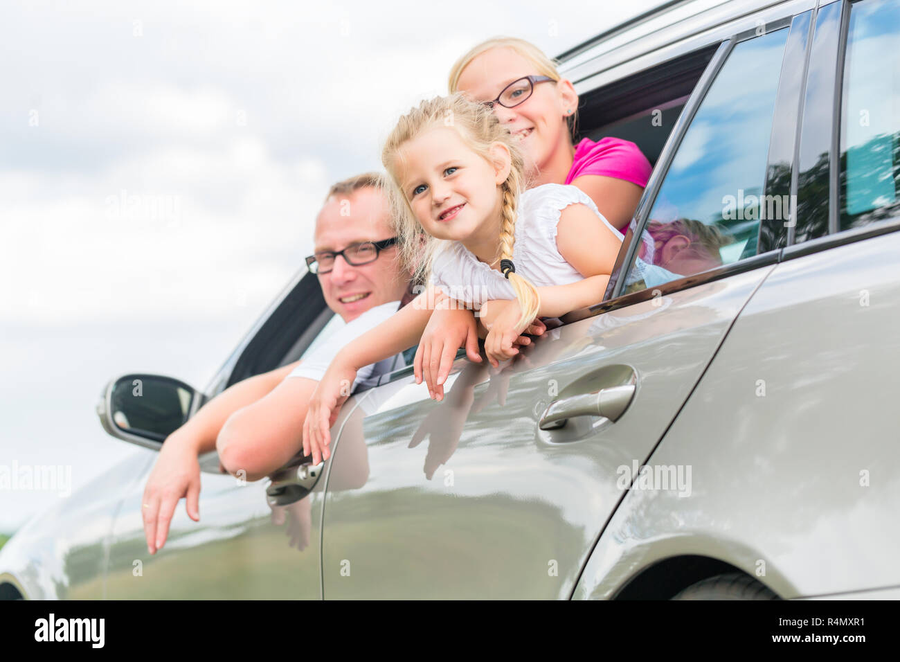 Family driving by car in summer vacation Stock Photo - Alamy
