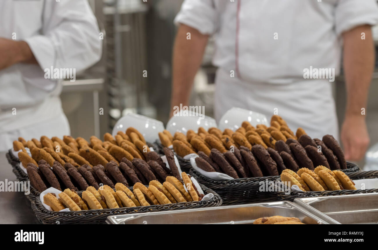 Cookies being baked in commercial kitchen Stock Photo - Alamy
