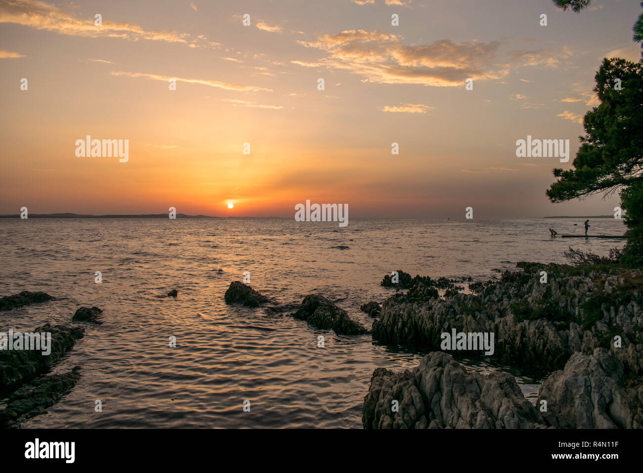 Colorful sunset over the Adriatic Sea, viewed from the croatian coast ...