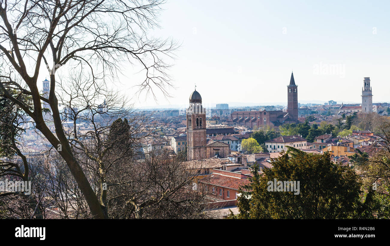 view of Verona city with urban towers in spring Stock Photo - Alamy