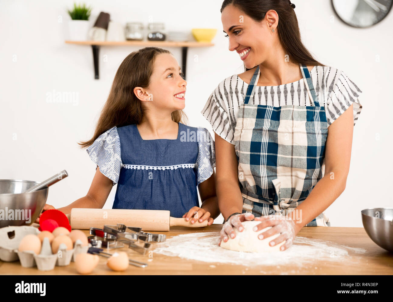 Learning to bake Stock Photo - Alamy