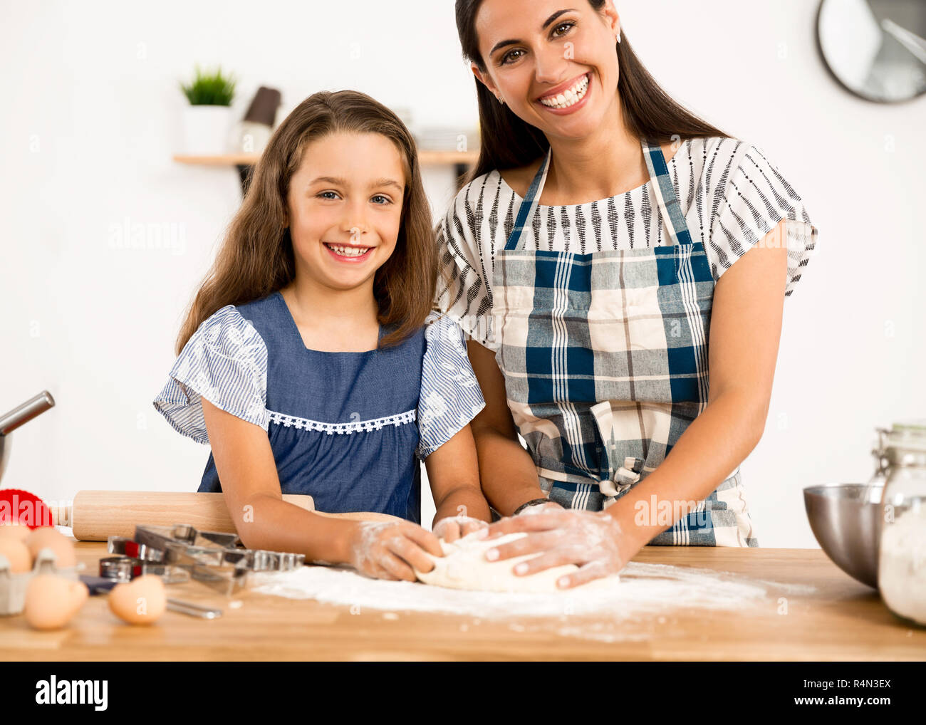Learning to bake Stock Photo - Alamy