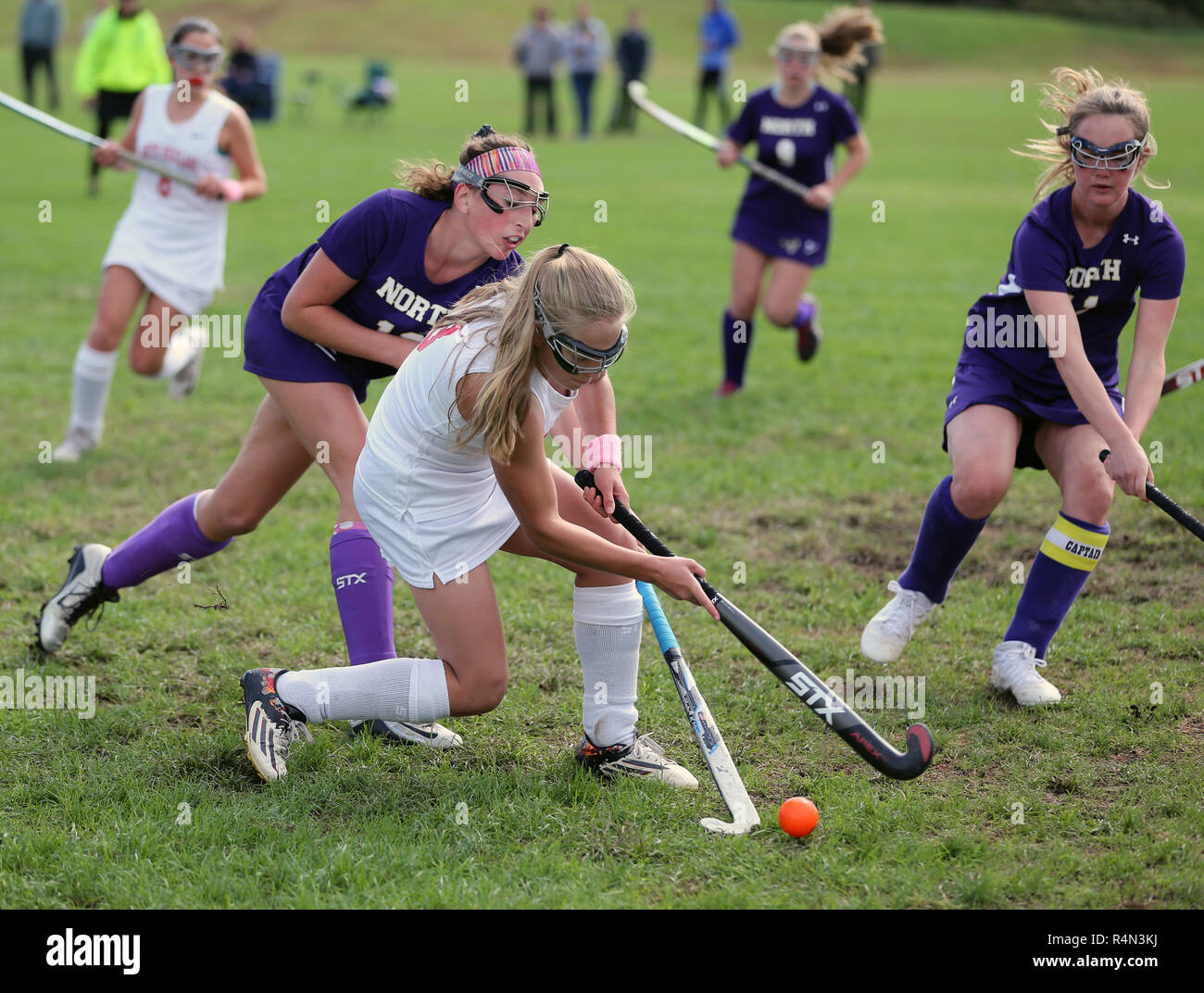 High school girls playing field hockey Stock Photo - Alamy