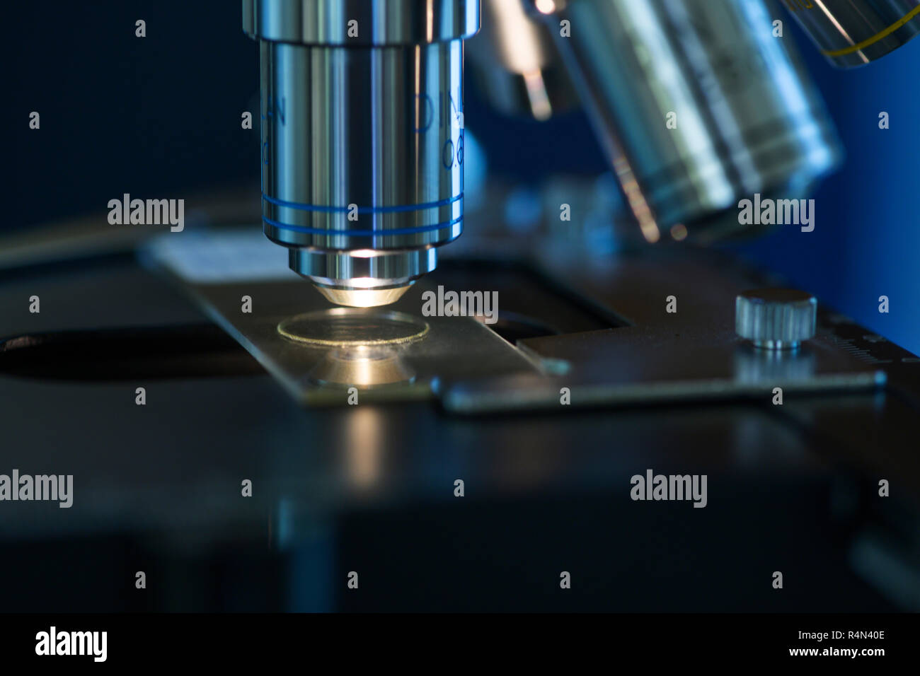 Close up of microscope lens Stock Photo - Alamy