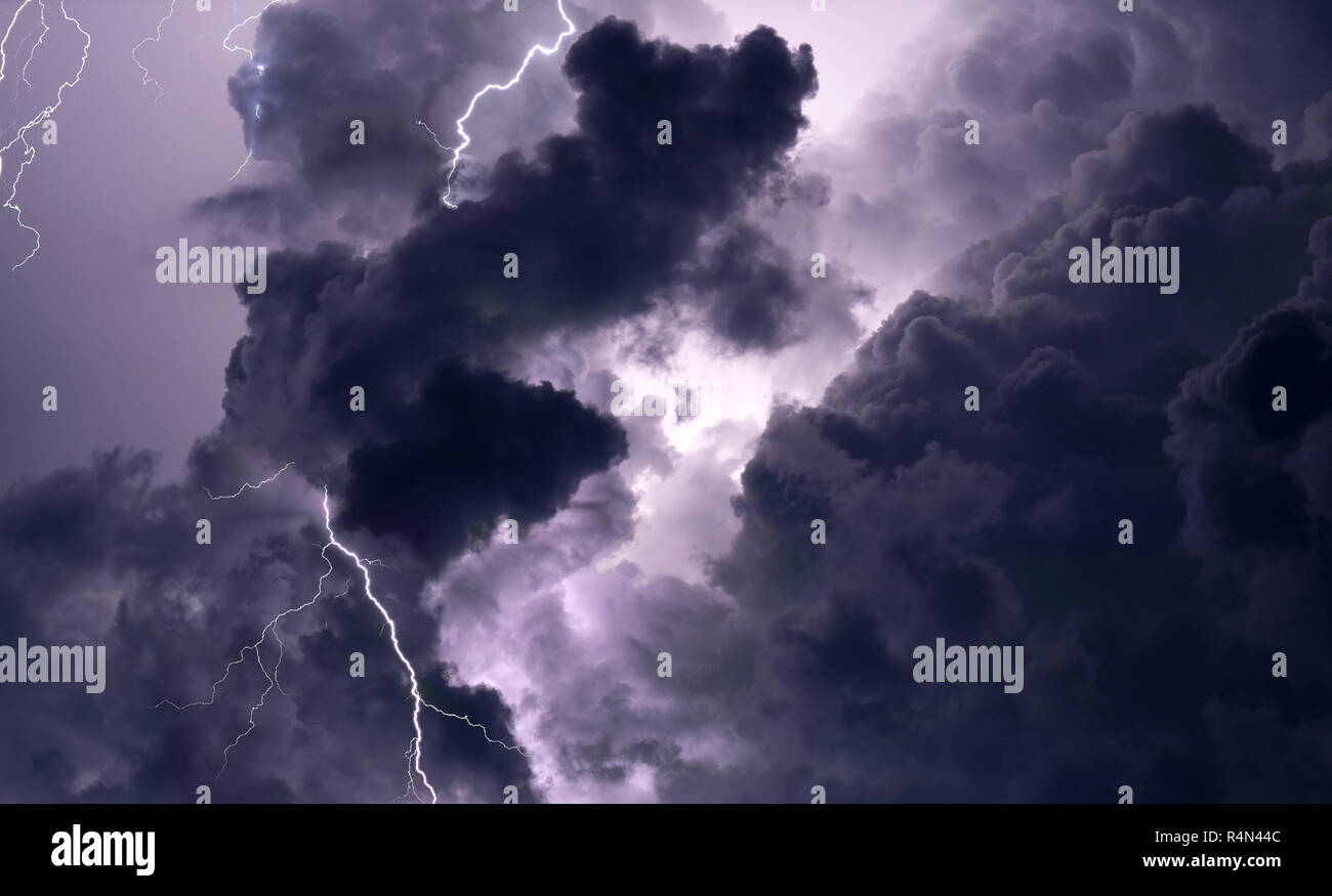 Lightning and storm clouds in sky Stock Photo - Alamy