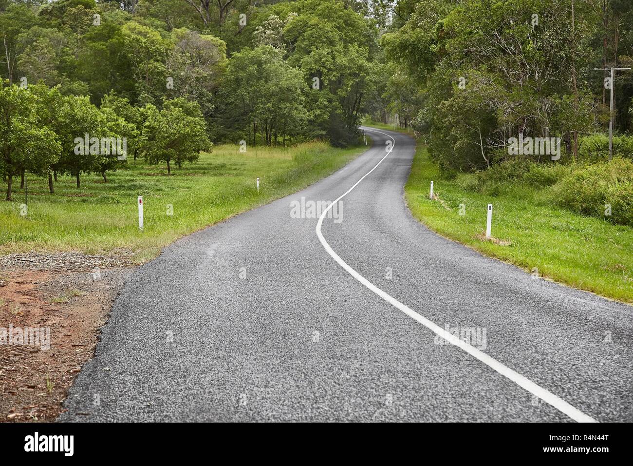 Road in the countryside Stock Photo - Alamy