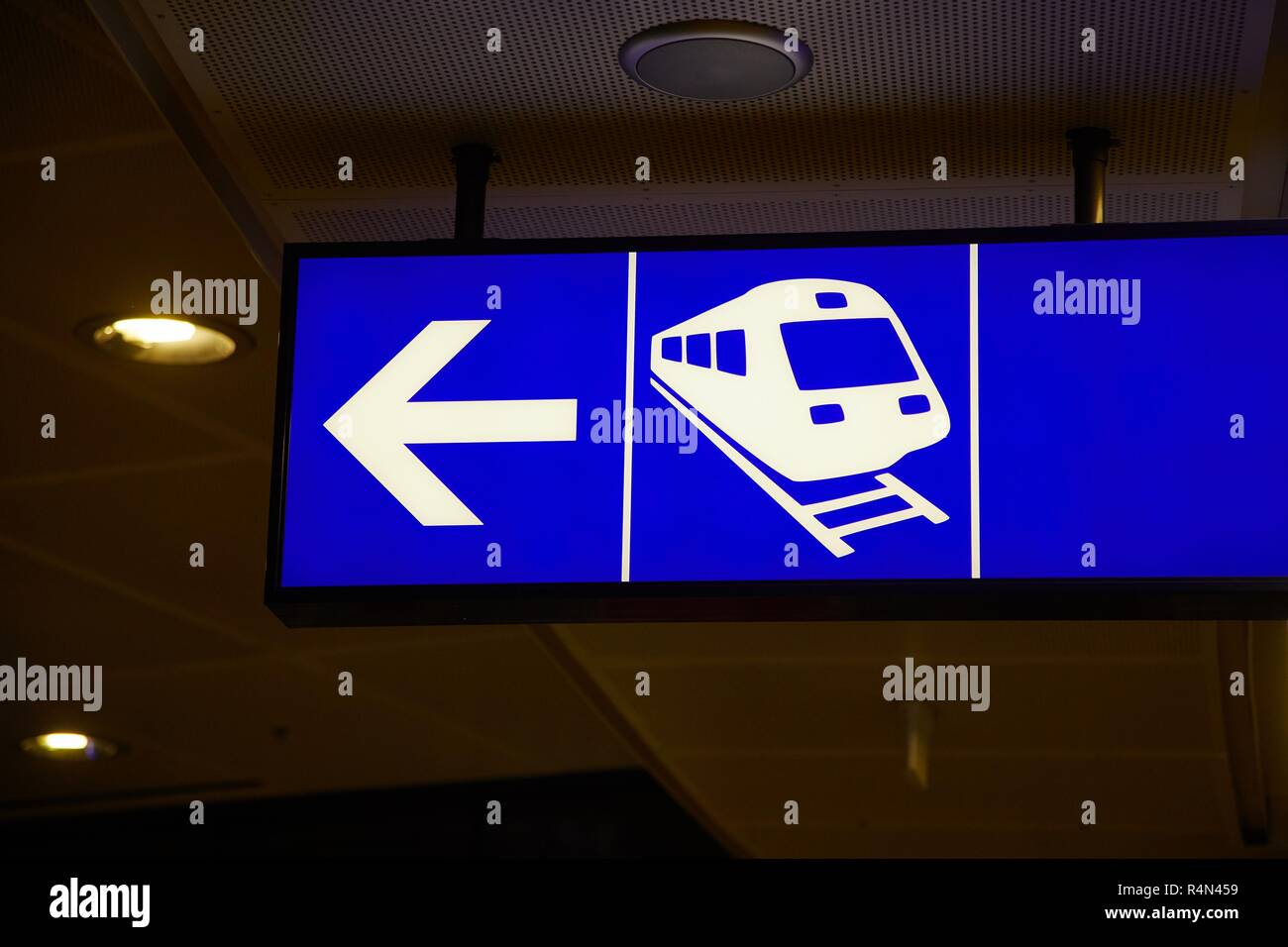 Train direction sign Stock Photo - Alamy