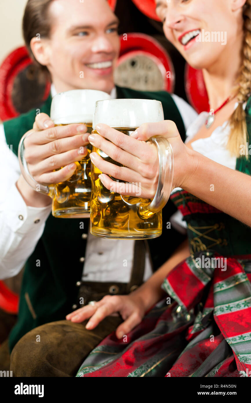 Couple drinking beer in brewery Stock Photo - Alamy
