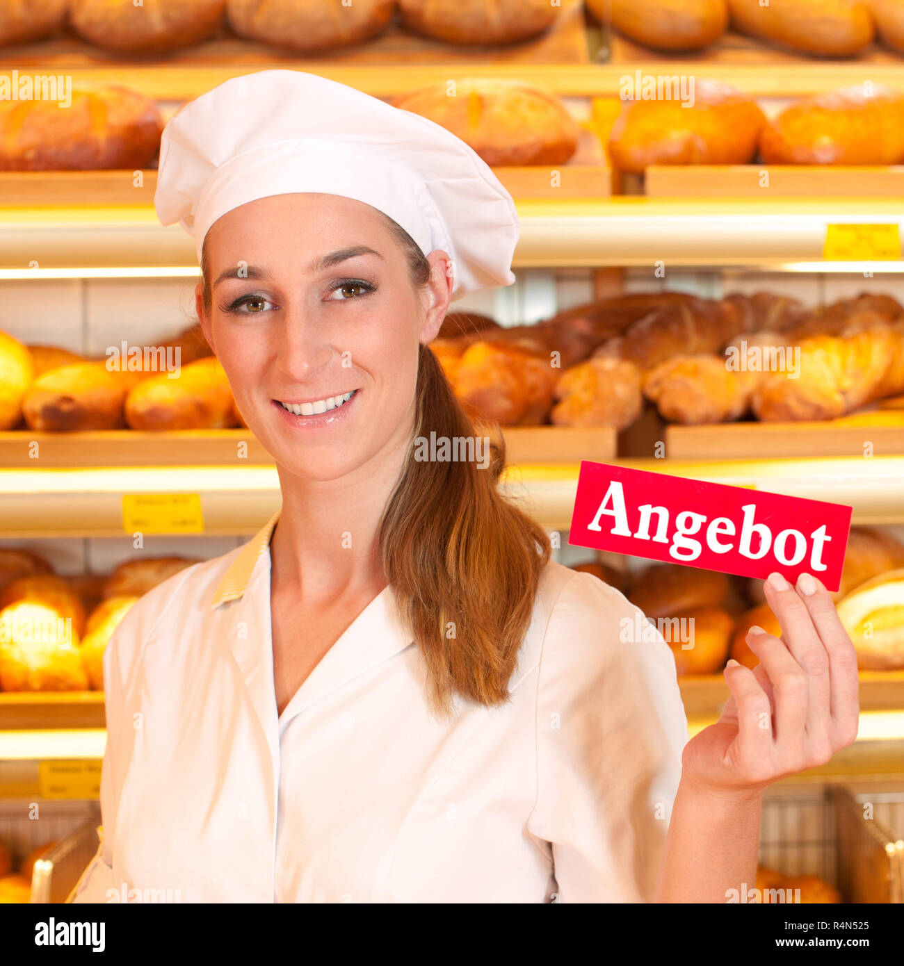 Baker selling bread in hi-res stock photography and images - Alamy