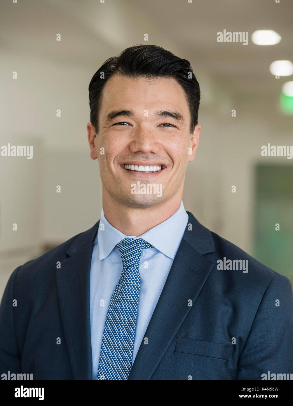 Portrait of Smiling businessman Stock Photo - Alamy
