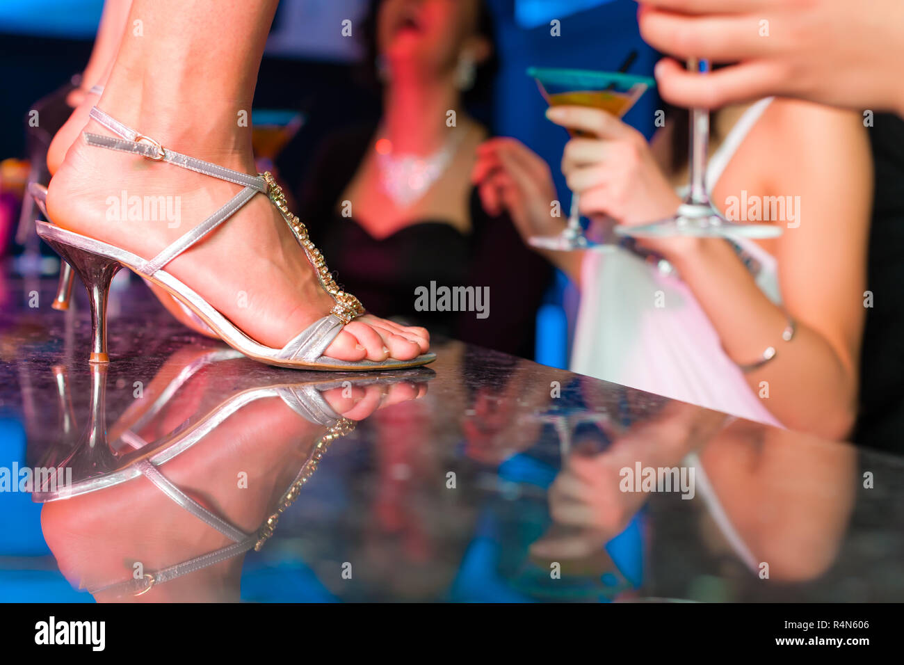 Girl dancing on bar in hi-res stock photography and images - Alamy