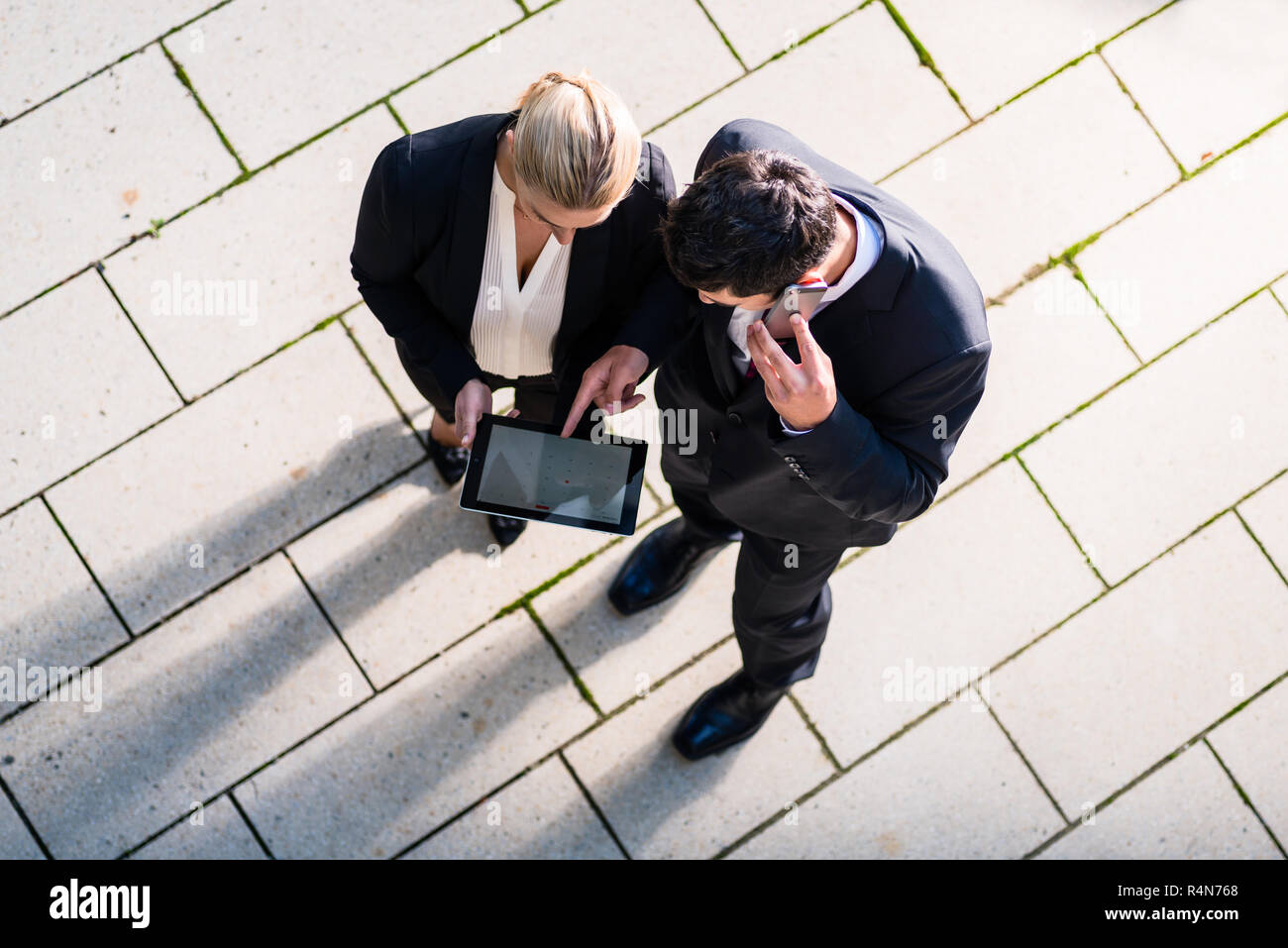 Business man and woman in top view Stock Photo - Alamy