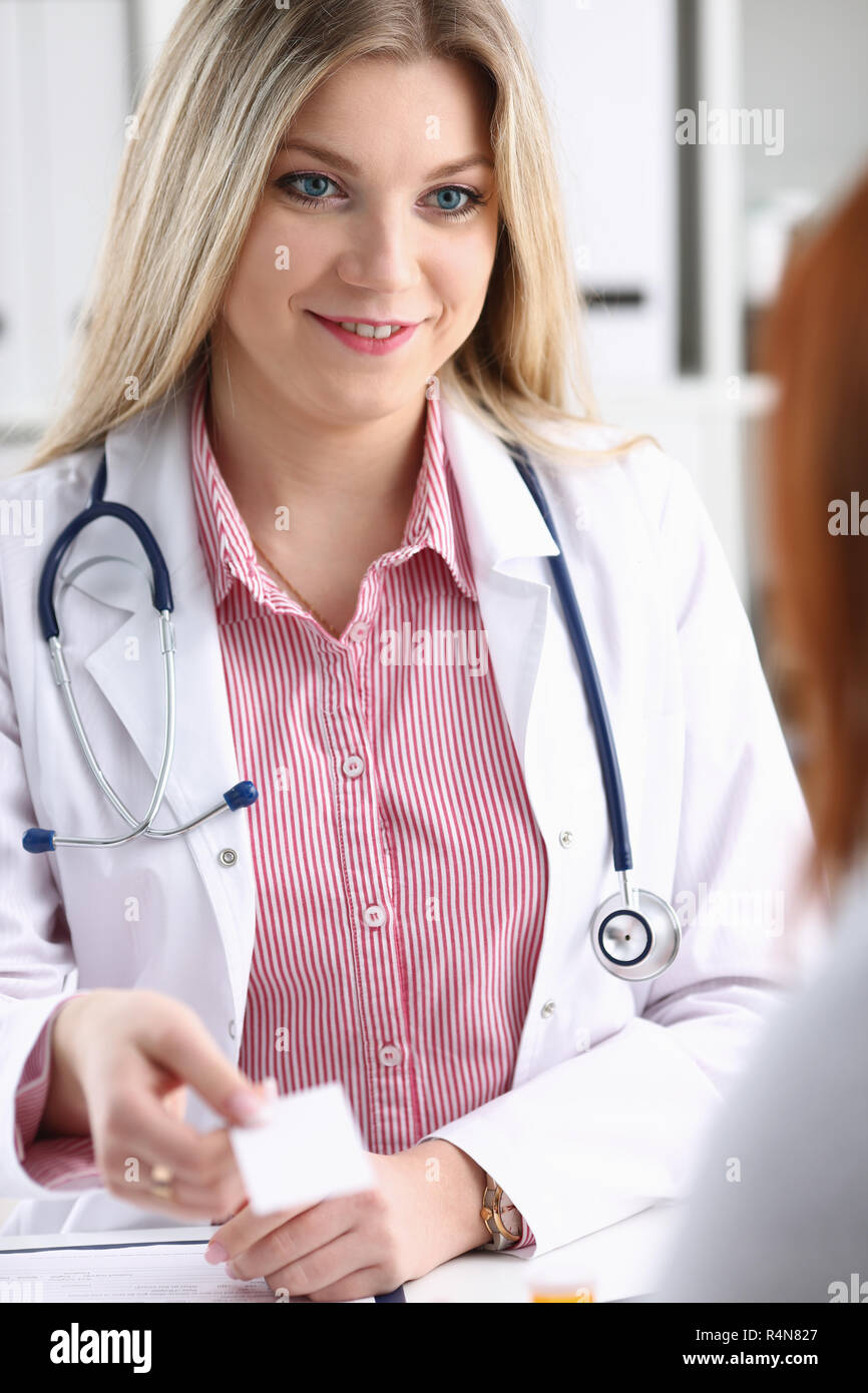 Smiling beautiful female medicine doctor explain diagnosis Stock Photo ...