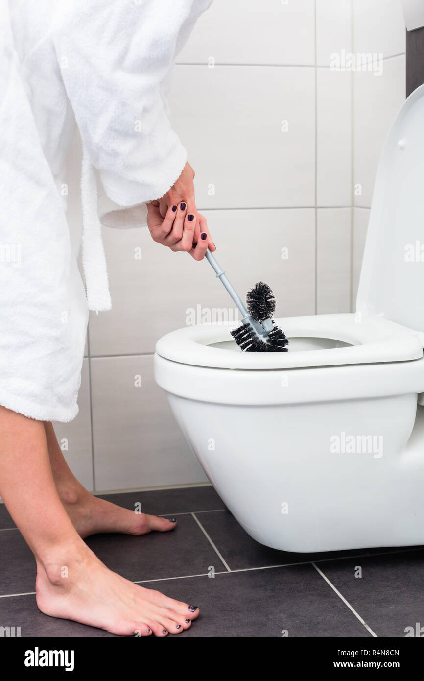 Woman loo brush hi-res stock photography and images - Alamy