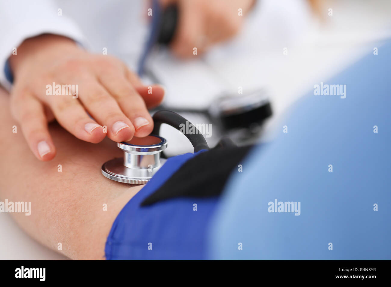 Female doctor arms make medic procedure closeup Stock Photo - Alamy