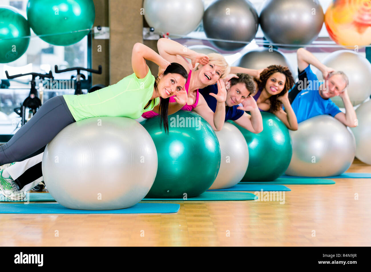 Senior diverse people exercising in hi-res stock photography and images ...