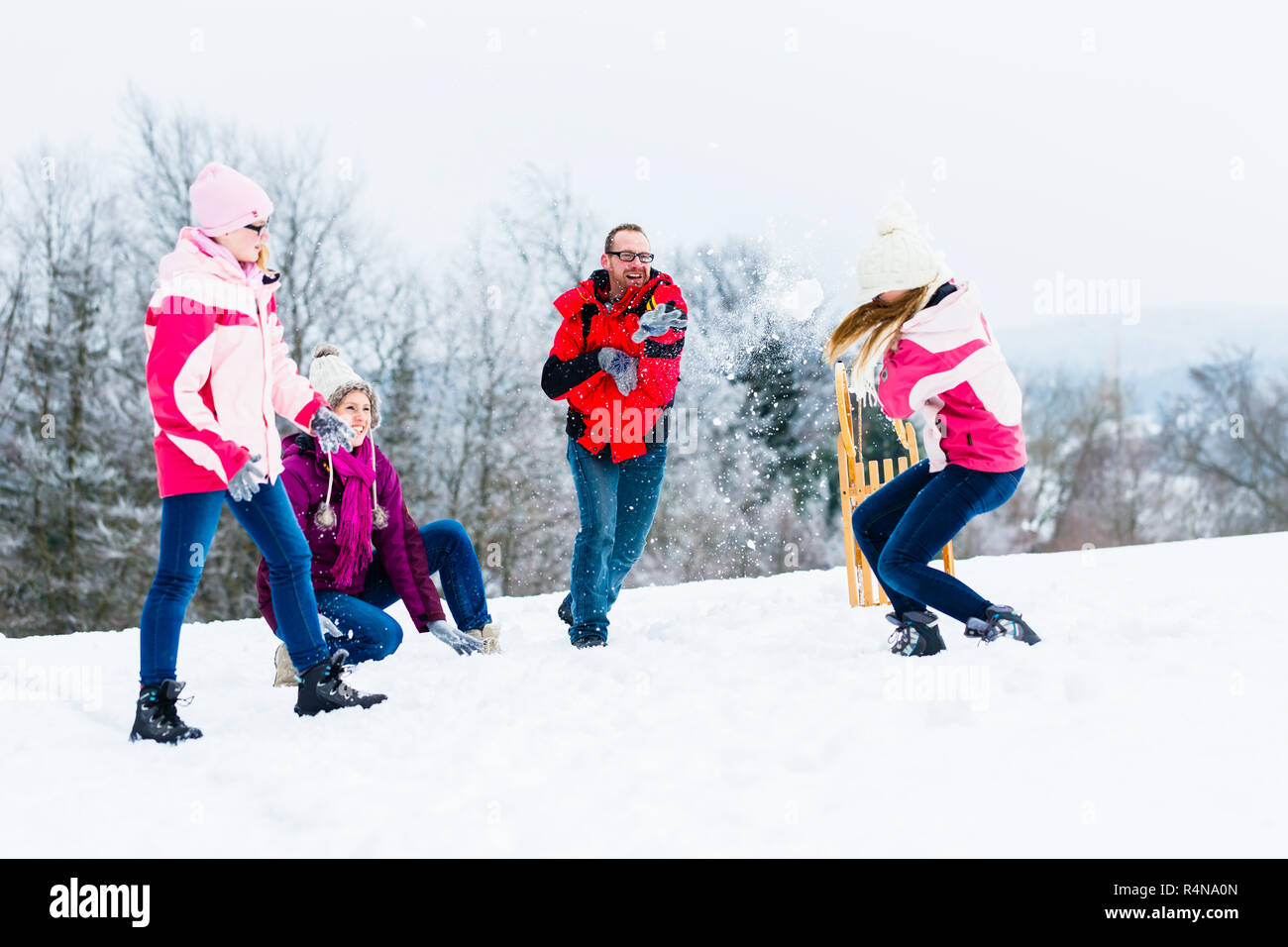 Snowball fighting children hi-res stock photography and images - Alamy