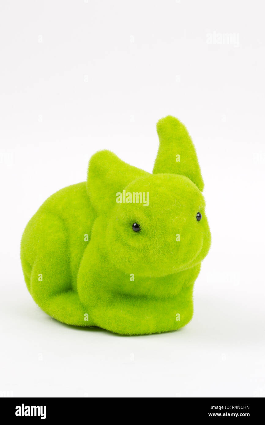 Green rabbit on a white background Stock Photo - Alamy