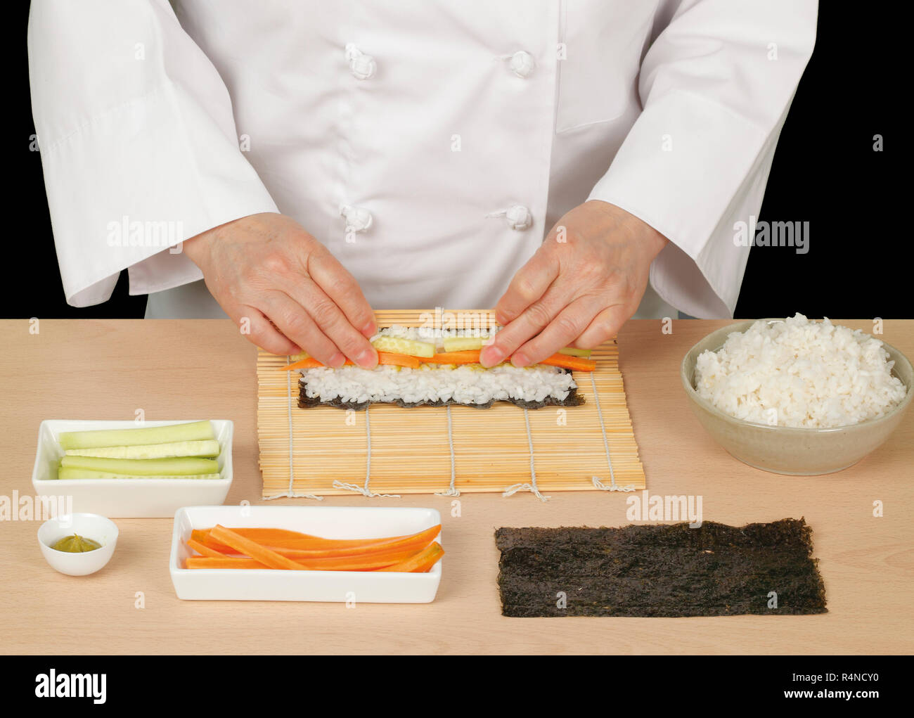 Sushi chef at work Stock Photo - Alamy