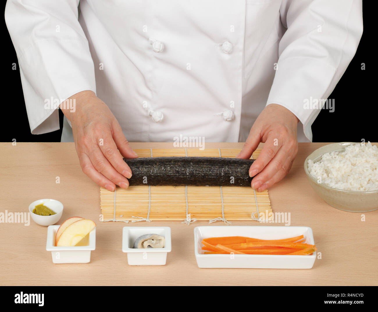 Sushi chef at work Stock Photo - Alamy