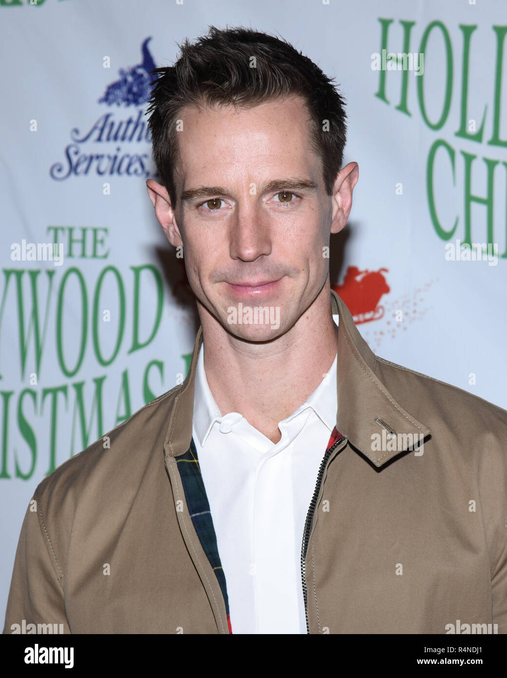 Jason Dohring arrives at the 87th Annual Hollywood Christmas Parade in ...