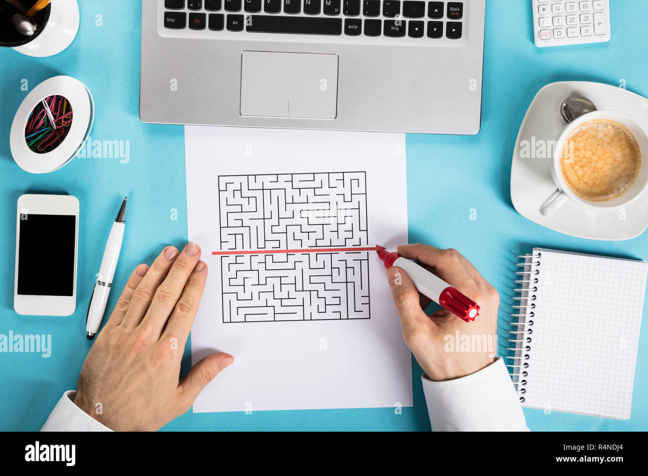 Business man desk labyrinth hi-res stock photography and images - Alamy